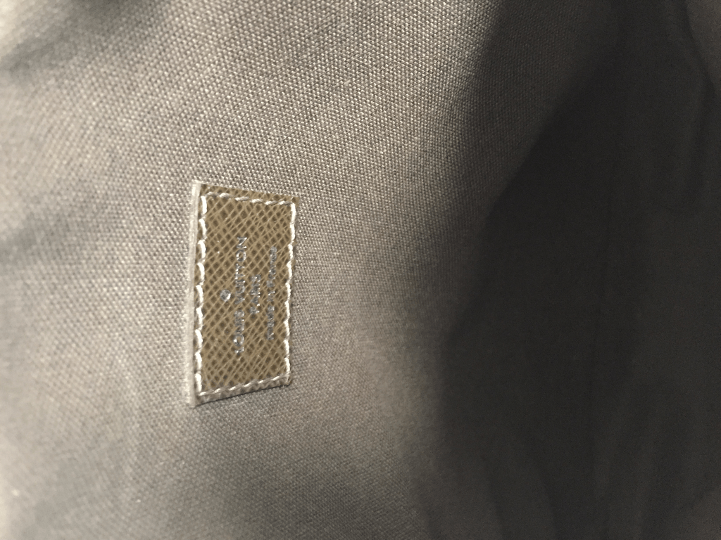 Louis Vuitton Brown Taiga Dimitri Bag – Oliver Jewellery